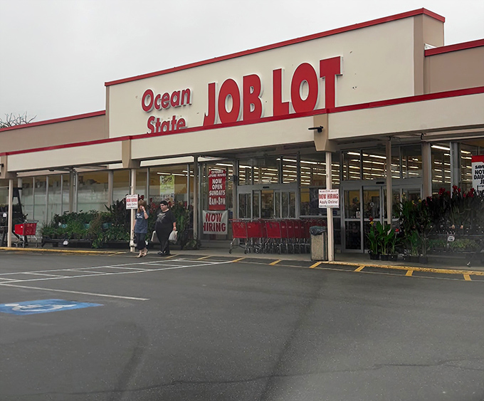 The iconic red and white façade of Ocean State Job Lot beckons bargain hunters like a retail lighthouse guiding ships to treasure-filled shores.