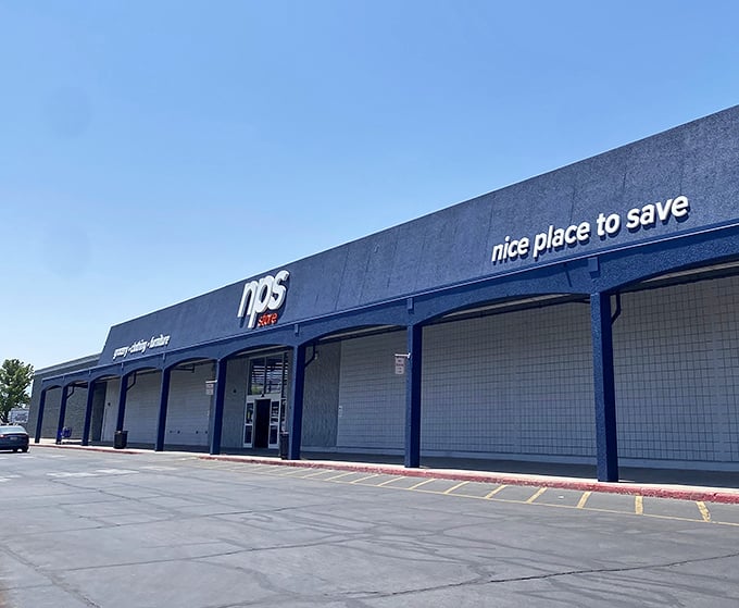 The blue fortress of frugality stands proudly against the Utah sky, promising treasure hunts where your wallet actually gains weight. 