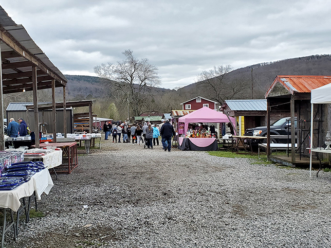 Gravel pathways lead visitors through a treasure hunter's paradise, with colorful vendor stalls stretching toward the distant Alabama hills.