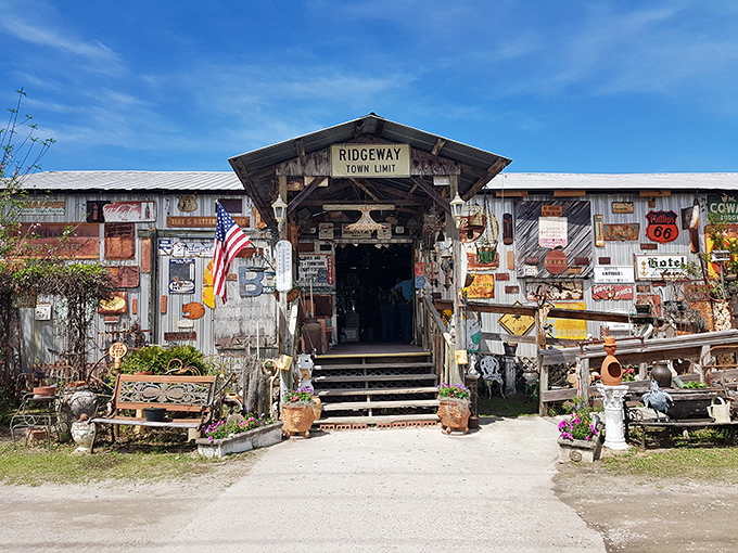 Step into "Ridgeway Town Limit" and prepare for sensory overload. This entrance, festooned with vintage signs, is the gateway to nostalgia heaven.