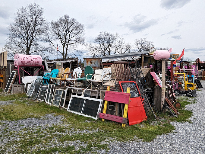 One person's junk is another's treasure trove! Window frames, colorful chairs, and quirky pink pig decorations create the perfect flea market aesthetic at Williams Grove.