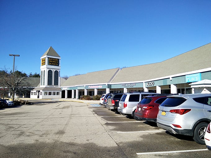 The iconic Kittery Premium Outlets tower stands like a retail lighthouse, guiding bargain hunters to safe harbor in a sea of shopping possibilities.