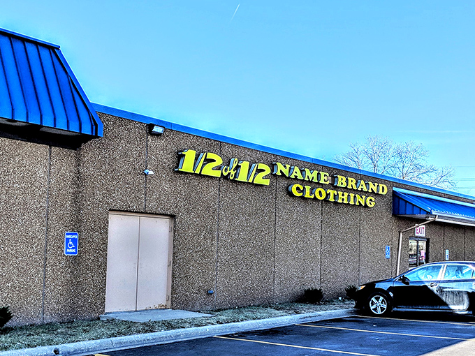 Mathematical fashion magic happens behind these walls, where the bright yellow "1/2 of 1/2" sign promises treasures at a fraction of their original price.