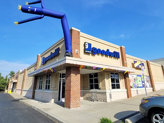 The blue inflatable tube man dances wildly above Goodwill's Warwick donation center, perhaps the most enthusiastic greeter you'll ever encounter at a shopping destination.