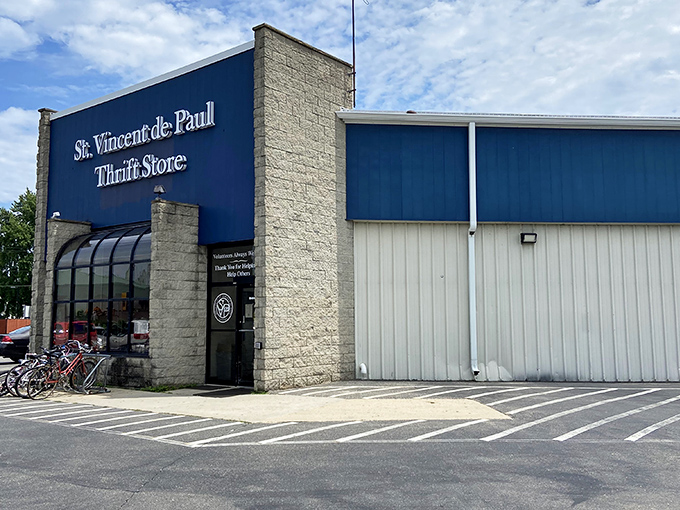 The blue-fronted treasure trove beckons bargain hunters with its unassuming facade, promising adventures in affordable retail therapy behind those doors.