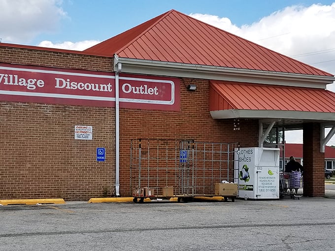 The iconic red roof of Village Discount Outlet beckons like a beacon to bargain hunters across Hammond. Treasure awaits inside!