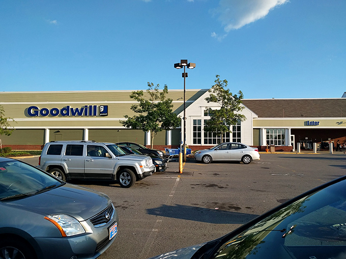The green and white exterior of Hudson's Goodwill beckons like a siren song to bargain hunters. Treasure awaits behind those automatic doors!