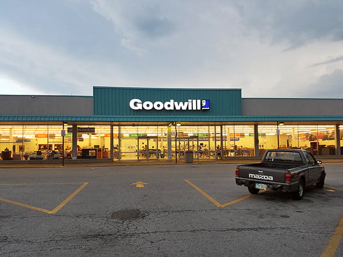 The teal-topped treasure chest of Akron beckons under moody Ohio skies. This unassuming storefront houses bargain adventures waiting to be discovered.
