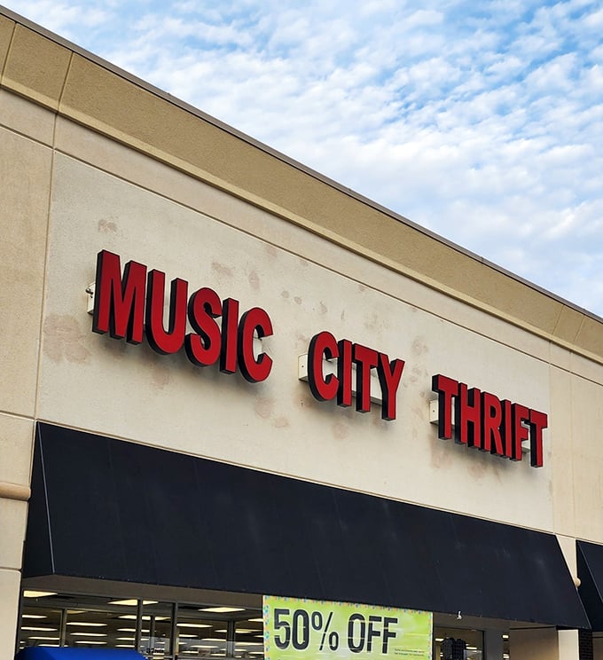 The bold red letters of Music City Thrift stand out against the Nashville sky like a beacon for bargain hunters with designer dreams.