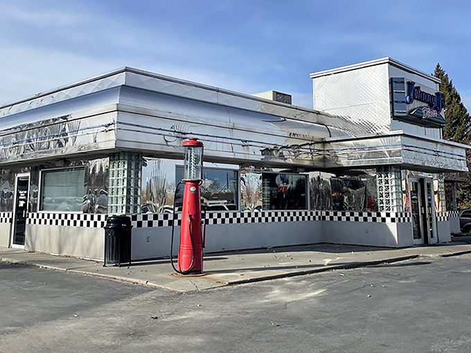 Even from the outside, Johnny J's promises a time-traveling culinary adventure with its vintage gas pump standing sentinel.