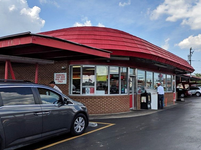 Carhop service still thrives at Doumar's, where your food arrives at your window like a delicious scene from American Graffiti.