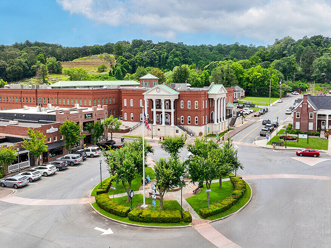 The historic courthouse anchors the town square, reminding everyone that some buildings deserve columns and actual architectural effort.