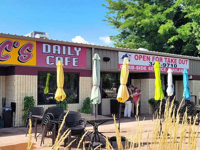 Colorful patio umbrellas add a festive touch to Vic's exterior, promising shelter from the New Mexico sun and proximity to pancakes.
