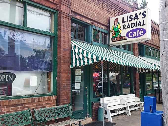 The unassuming brick exterior of Lisa's Radial Cafe proves once again that the best breakfast spots don't need fancy facades&mdash;just that perfect green-and-white awning signaling comfort inside.
