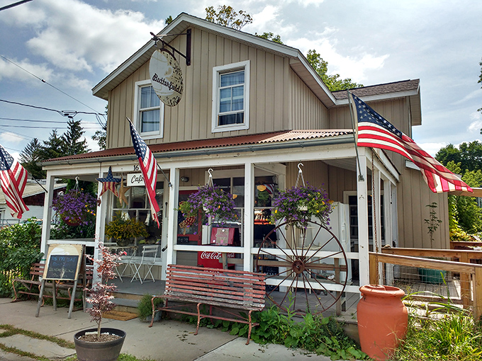 Summer sunshine bathes Butterfields in golden light, highlighting hanging flower baskets that add splashes of purple to this breakfast sanctuary. The perfect small-town postcard come to life.