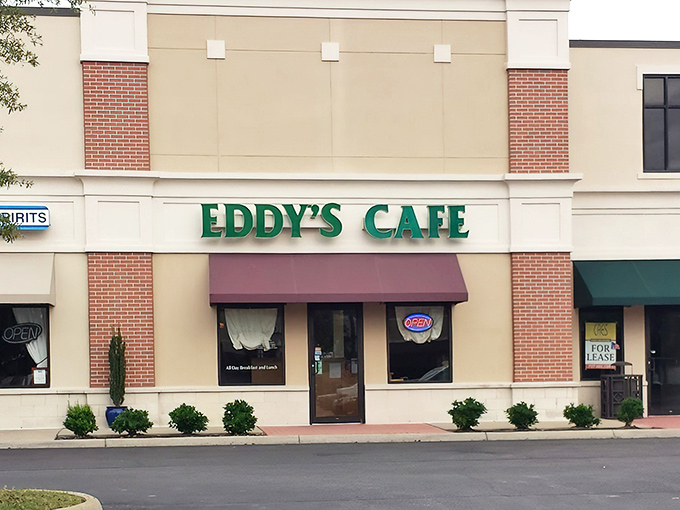 The emerald green sign of Eddy's Cafe beckons like a lighthouse for hungry souls navigating the strip mall seas of Virginia Beach.