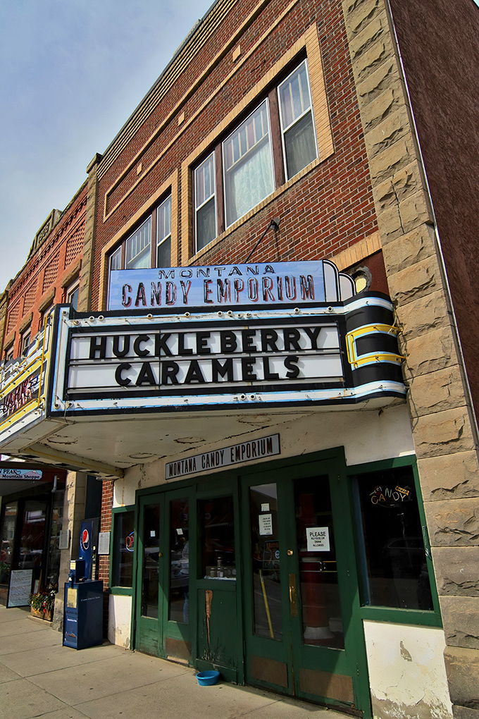 The marquee says it all: "Huckleberry Caramels" beckon from this vintage storefront, promising sweet treasures behind those green doors.