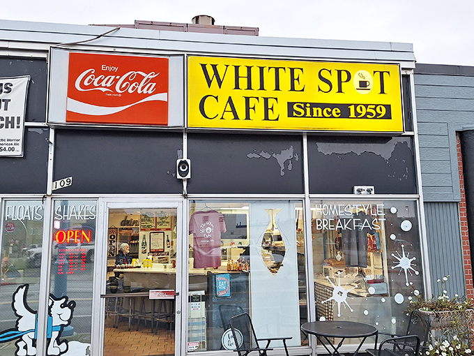The iconic yellow and red signage of White Spot Cafe stands as a beacon of breakfast hope in Anchorage, promising comfort food that's stood the test of time since 1959.