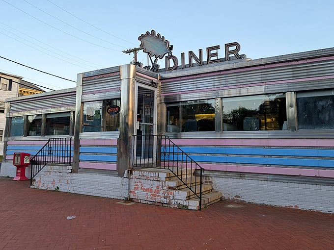 The gleaming stainless steel exterior of Salem Oak Diner stands as a time capsule of Americana, complete with that iconic blue stripe that practically screams "good food inside!"