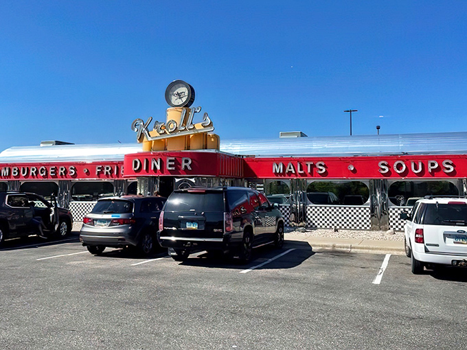 Gleaming chrome, bold red signage, and that iconic clock &ndash; Kroll's Diner stands as a shining beacon of comfort food against the North Dakota sky.