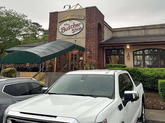 The brick fa&ccedil;ade and signature green awning of The Butcher Shop stand as a beacon to carnivores throughout Little Rock. Meat paradise awaits beyond those doors.
