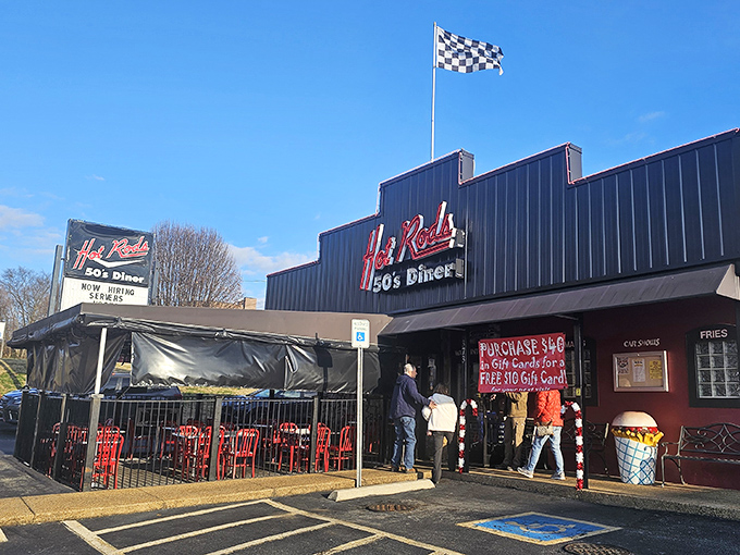 The checkered flag waves you home to Hot Rods, where that glowing neon sign promises a journey back to simpler, delicious times.