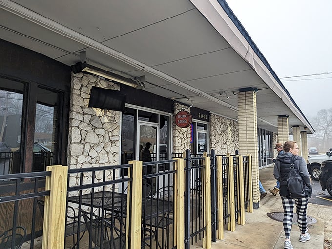 The stone facade of Burg & Barrel welcomes hungry patrons with a promise of comfort food and cold brews in Overland Park.