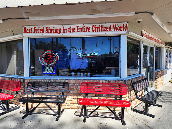 Red benches welcome hungry visitors beneath Doc's famous slogan—a confident declaration that's backed up by decades of delicious proof.