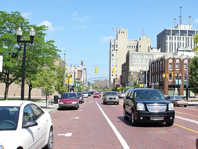 Saginaw Street's iconic brick roadway leads visitors through downtown Flint, where history meets modern revival in Michigan's Vehicle City.