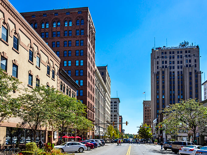 Downtown Youngstown's architectural time capsule stands proudly against a blue sky, where Art Deco dreams and affordable mortgages live in perfect harmony.
