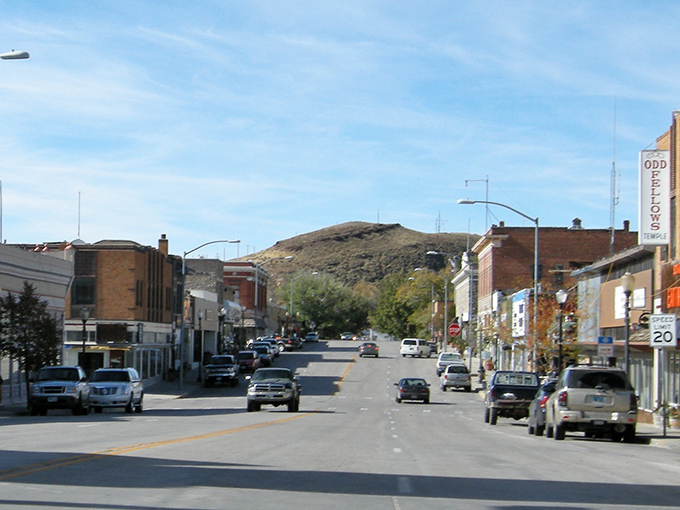 Rawlins sits nestled against rolling hills, a genuine Western town where authenticity costs less than artificial charm.