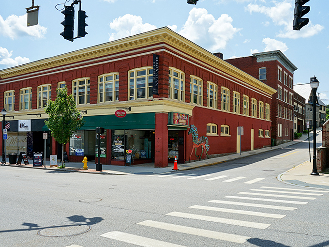 Classic brick architecture anchors downtown Torrington, where retirement dollars stretch further than your morning walk through the town square.