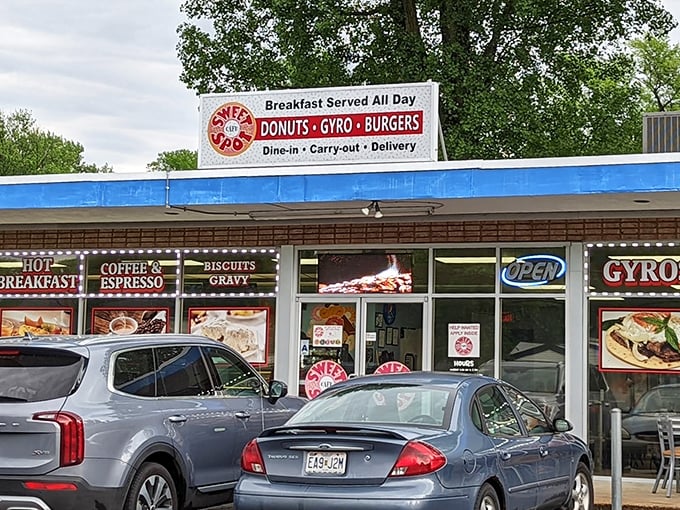 The unassuming blue-trimmed exterior of Sweet Spot Cafe proves once again that culinary treasures often hide in plain sight. Breakfast served all day? That's music to my ears.