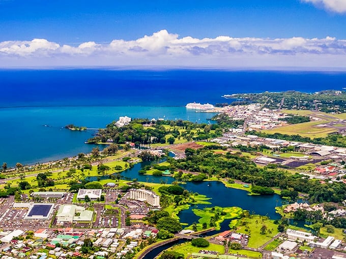 Hilo's stunning aerial view reveals its perfect blend of blue waters, lush landscapes, and historic downtown &ndash; like a tropical snow globe without the snow.