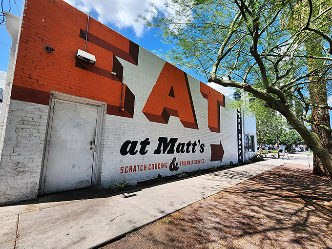 Bold red letters announce what you're here for—EAT—while "scratch cooking" promises no corners cut in your morning feast.