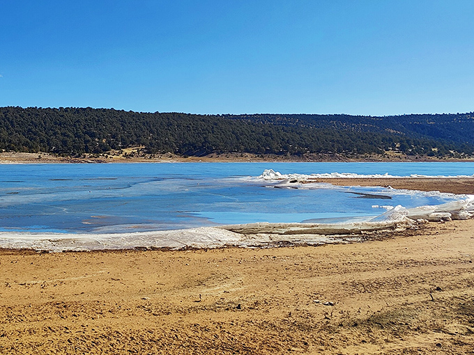 Mother Nature's mood ring in action – Bluewater Lake's shoreline shifts with the seasons, creating a mesmerizing border between azure waters and golden sands.