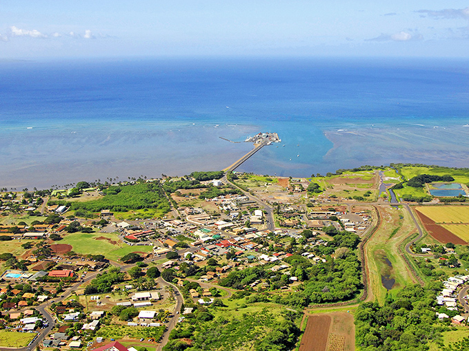 Kaunakakai stretches toward the sea with its iconic pier, where island life unfolds at nature's unhurried pace.