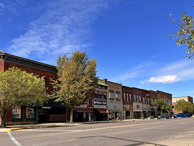 Downtown Storm Lake's historic buildings stand like a lineup of old friends, their brick facades telling stories of generations who've strolled these sidewalks before you.