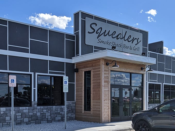 The contemporary facade gleams in South Dakota sunshine, a beacon for barbecue pilgrims seeking salvation in smoked meat form.
