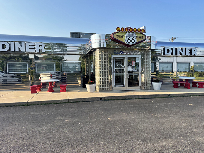 Chrome so bright you might need sunglasses! The Route 66 Diner's gleaming exterior promises a time-traveling feast for both eyes and stomach.