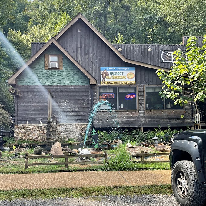 Where the wild things eat! Sunlight dapples through the trees onto this charming cabin, complete with a bubbling fountain that adds tranquility to your meal.