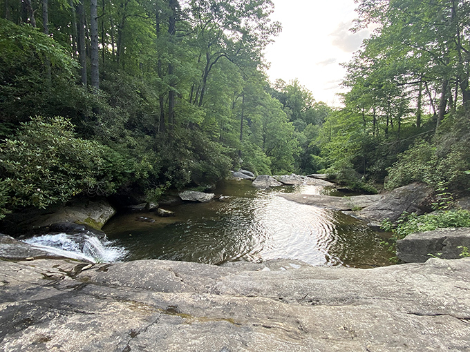 Nature's own infinity pool. Jacob Fork River creates perfect swimming holes where the only membership fee is the willingness to brave refreshingly cool mountain water.