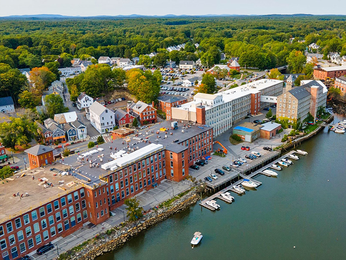 Newmarket's historic mills stand proudly along the Lamprey River, their brick facades reflecting centuries of New England ingenuity and a second act as vibrant community spaces.