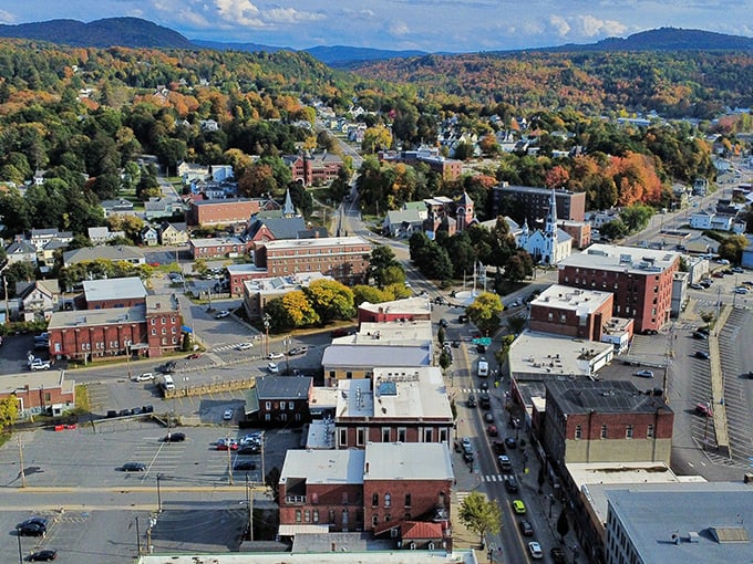 The town sprawls beneath autumn's touch, a patchwork quilt of history, community, and surprisingly affordable real estate.