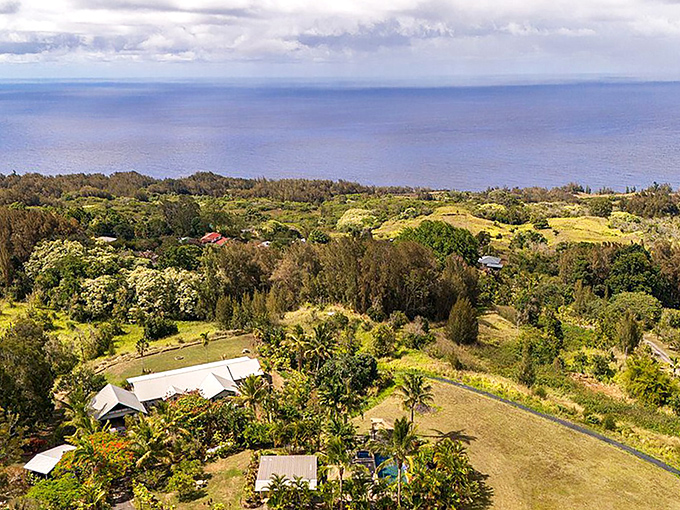 The view that makes you question why you ever stress about anything. Honoka'a's coastline stretches toward infinity, reminding us paradise isn't always crowded.