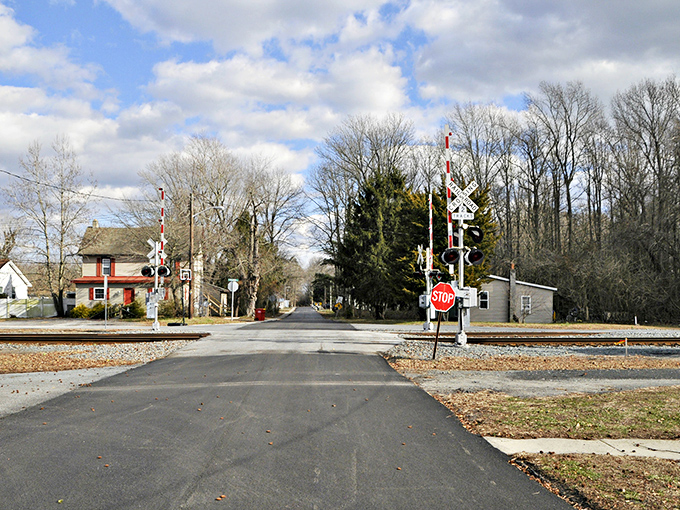 Railroad crossings remind us of Ellendale's historical connections, where time seems to move at a more civilized pace.