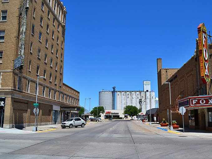 Brick streets that whisper tales of yesteryear, lined with charming storefronts where your dollar stretches like saltwater taffy on a summer day.