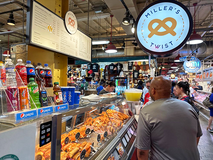 That iconic pretzel logo hanging above the bustling market aisle is your North Star to carbohydrate bliss.