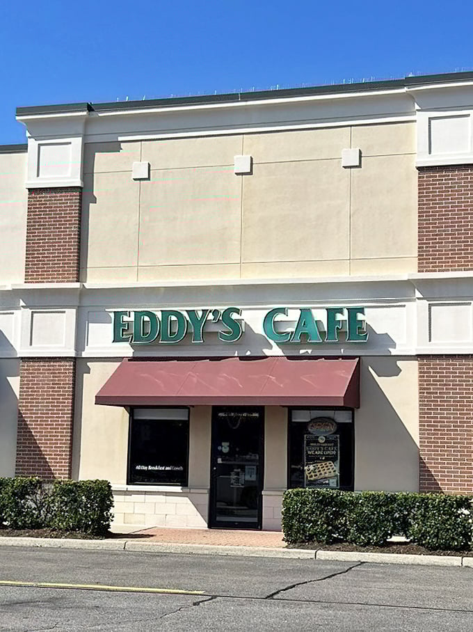 The emerald green sign of Eddy's Cafe beckons like a lighthouse for hungry souls navigating the strip mall seas of Virginia Beach.