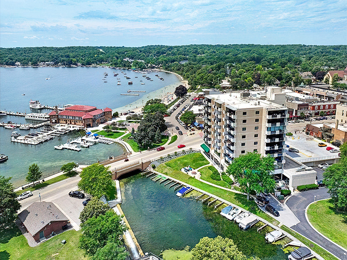 Lake Geneva's downtown waterfront offers a perfect blend of natural beauty and urban convenience. From this aerial view, you can practically hear the boat motors humming.